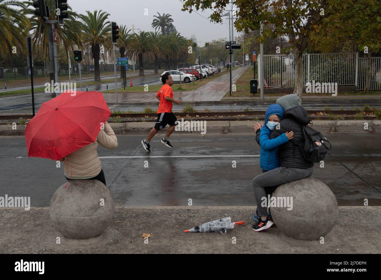 May 8, 2022, Santiago, Metropolitana, Chile: A boy hugs his mother as ...