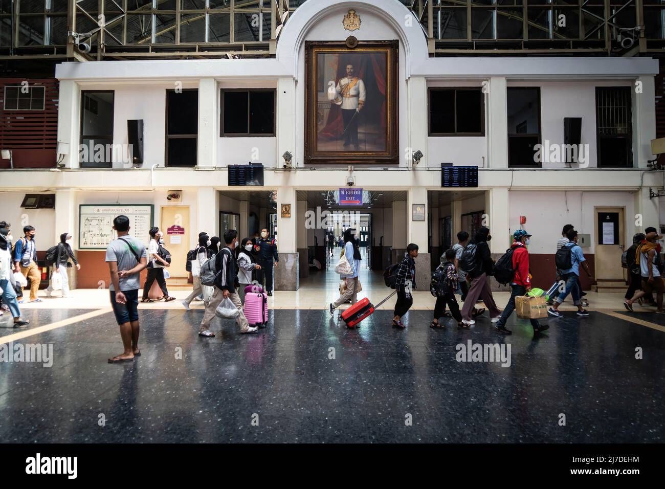 People exit Hua Lamphong, also known as Bangkok Railway Station, after ...