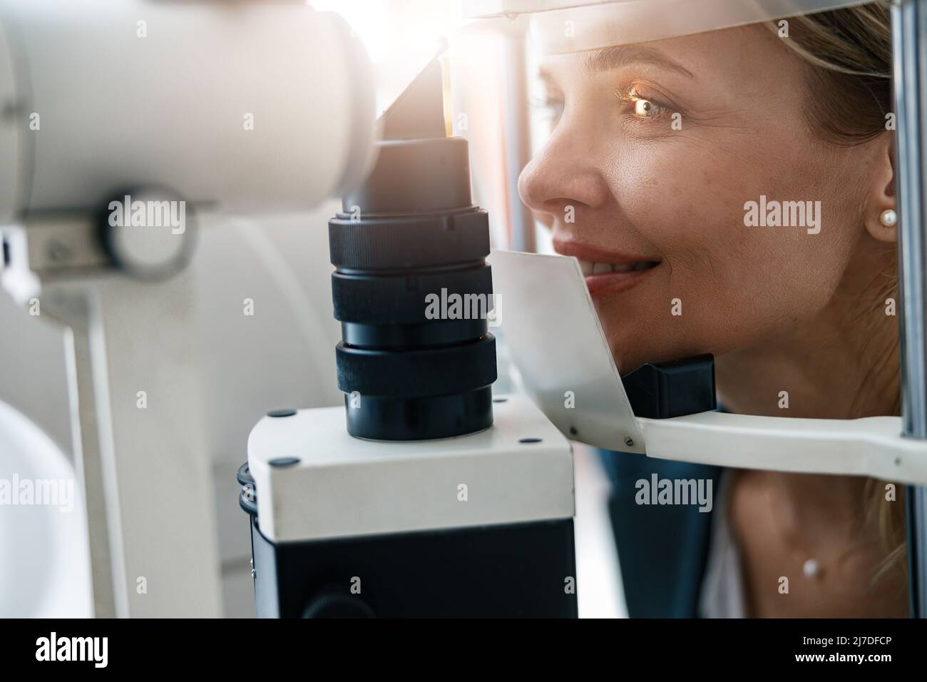 Close up of a patient's vision check at an opticians shop or ...