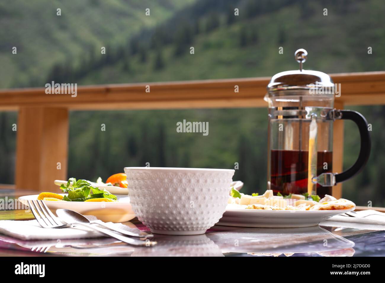 Breakfast in the early morning outdoors in a country house Stock Photo ...