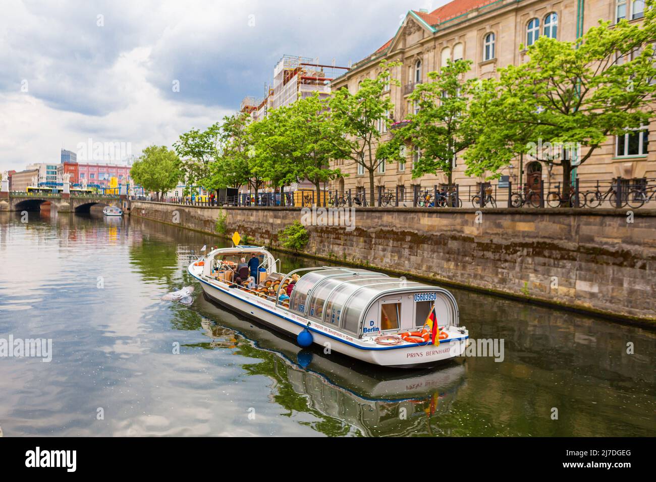 Pleasure boat with vacationers in the city river channel. Berlin ...