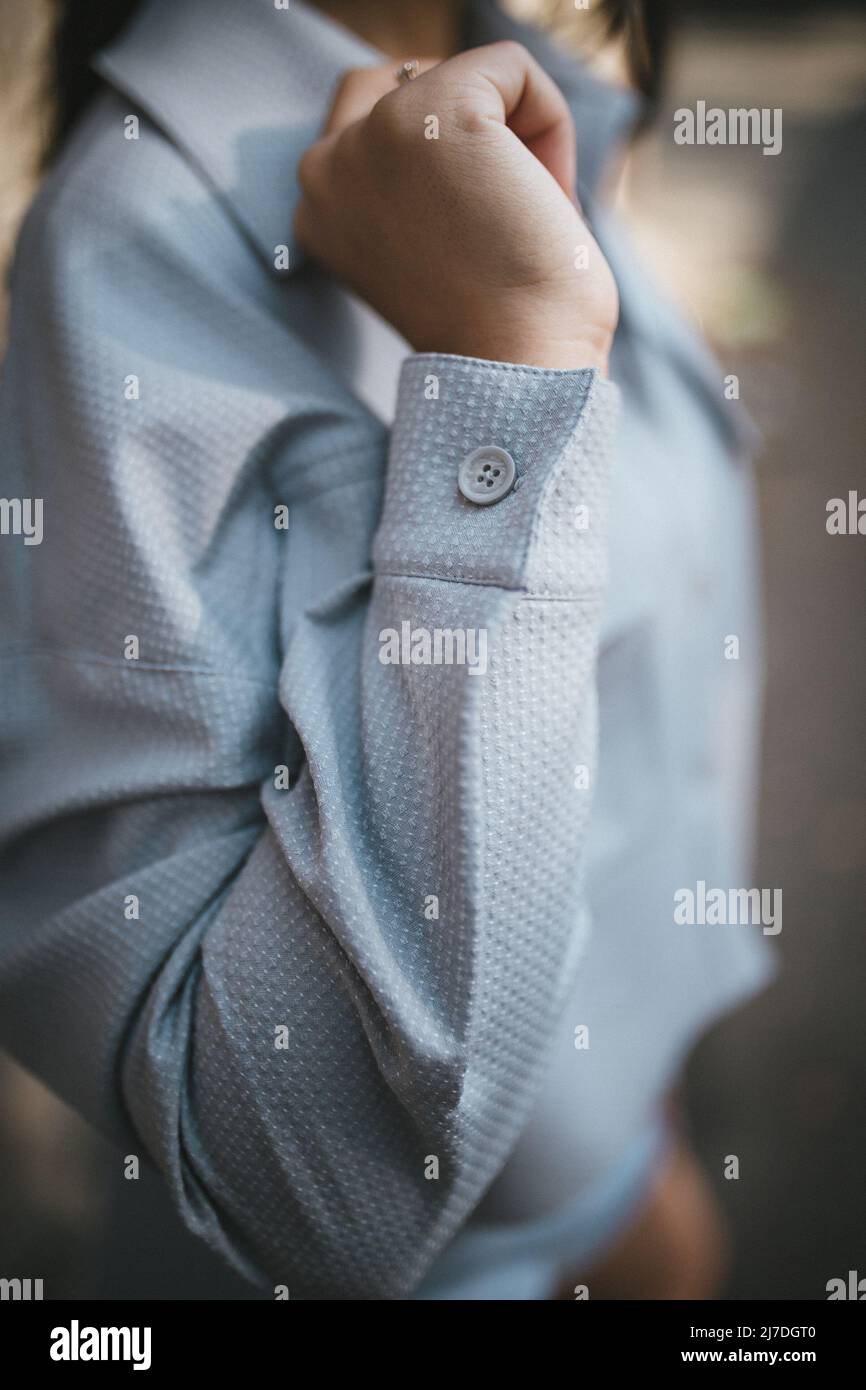 girl in gray shirt close-up, fabric texture Stock Photo - Alamy