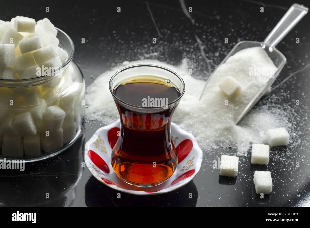 Traditional and Classic Turkish Tea with sugar cubes and granulated ...