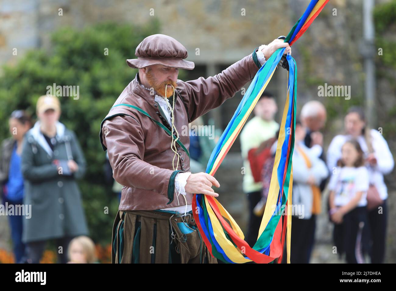 Maypole dancing for May Day at historic Hever Castle in Kent, UK Stock ...