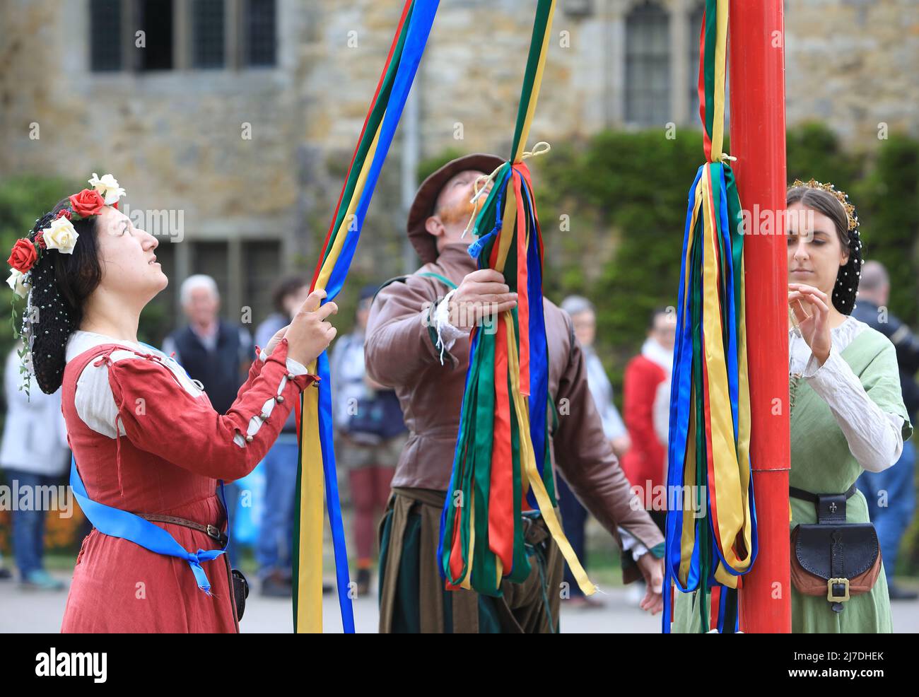 Maypole dancing for May Day at historic Hever Castle in Kent, UK Stock ...