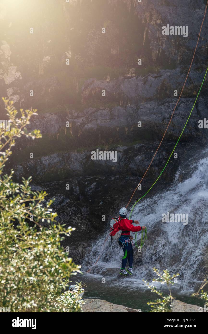 Waterfall Rappelling On Canyoning Adventure Stock Photo - Alamy