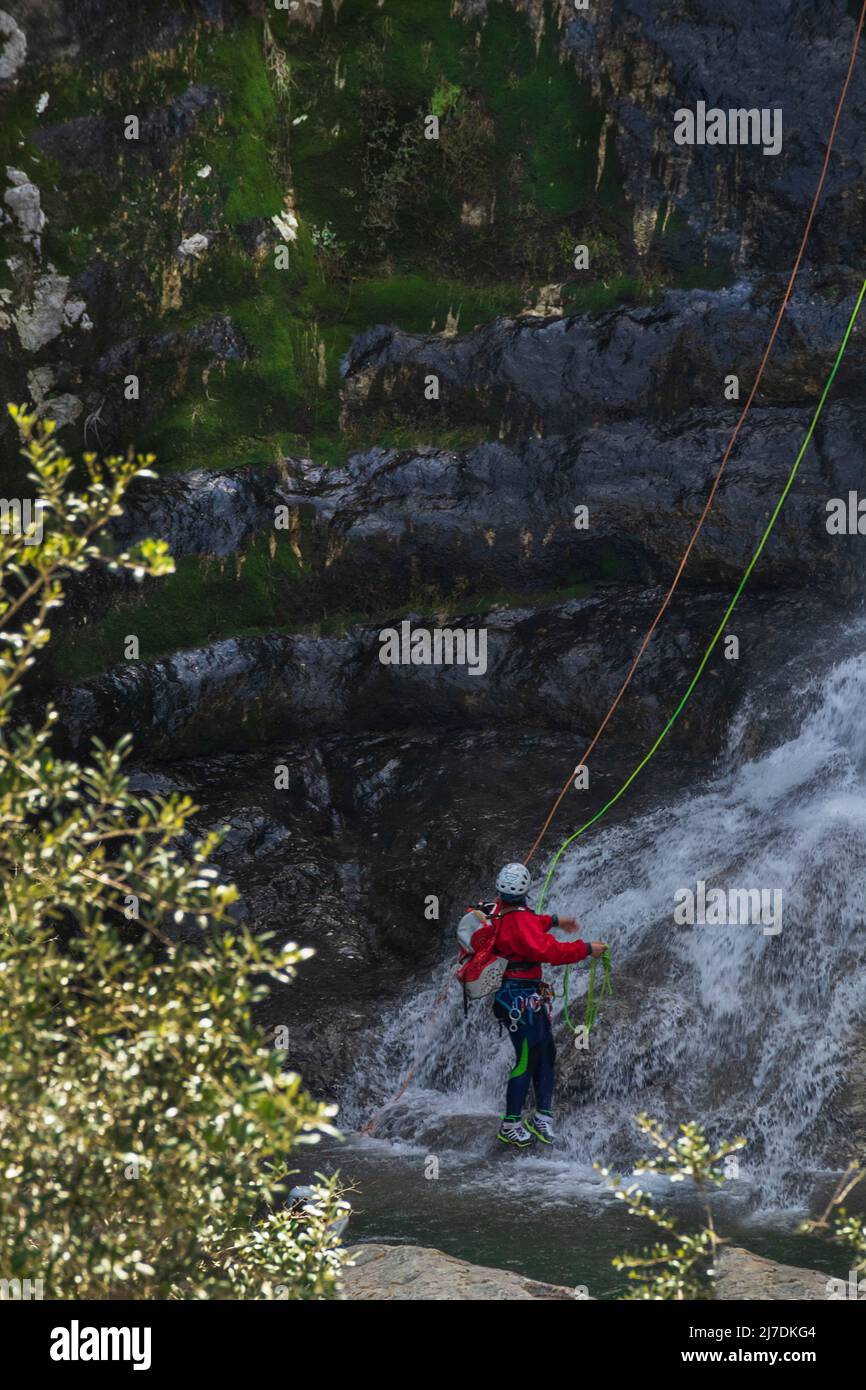 Waterfall Rappelling On Canyoning Adventure Stock Photo - Alamy