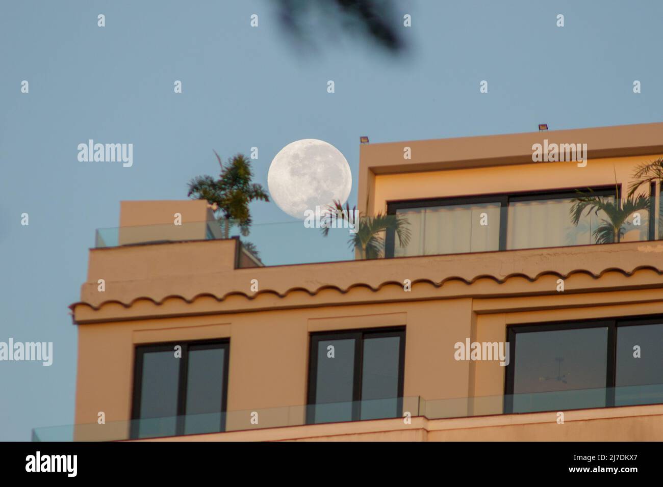 full moon setting Rio de Janeiro Stock Photo - Alamy