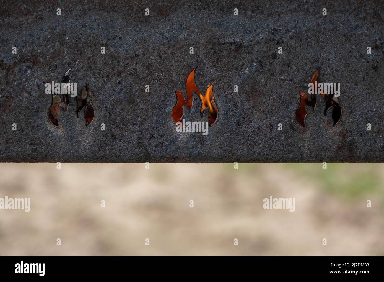 Blazing fire flame background and textured. metal grill Stock Photo - Alamy