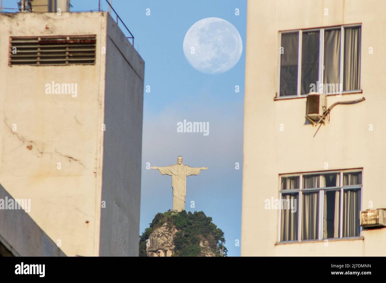 Christ the Redeemer and the full moon in Rio de Janeiro, Brazil - April ...