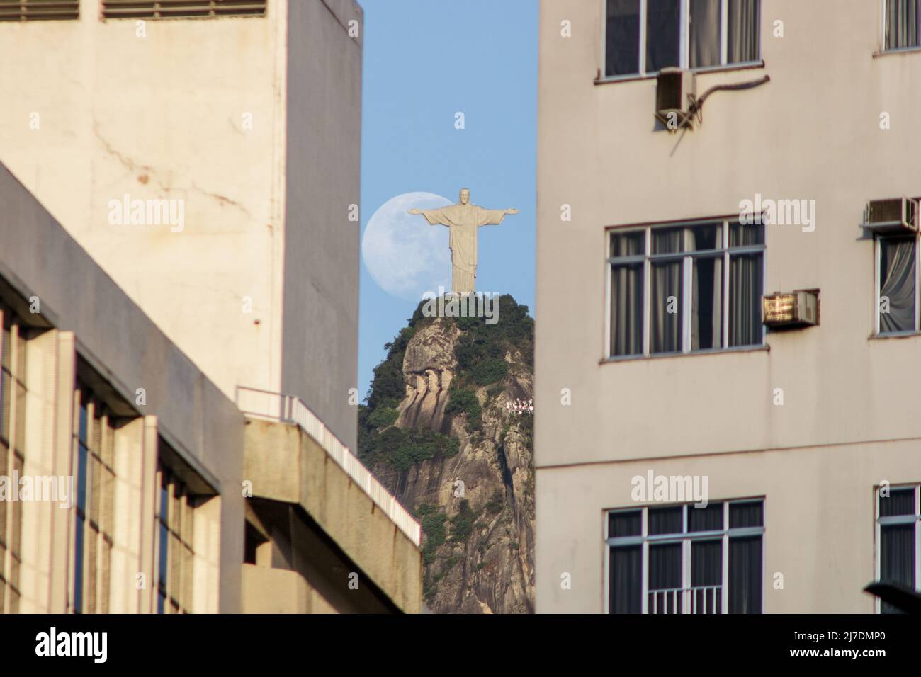 Christ the Redeemer and the full moon in Rio de Janeiro, Brazil - April ...