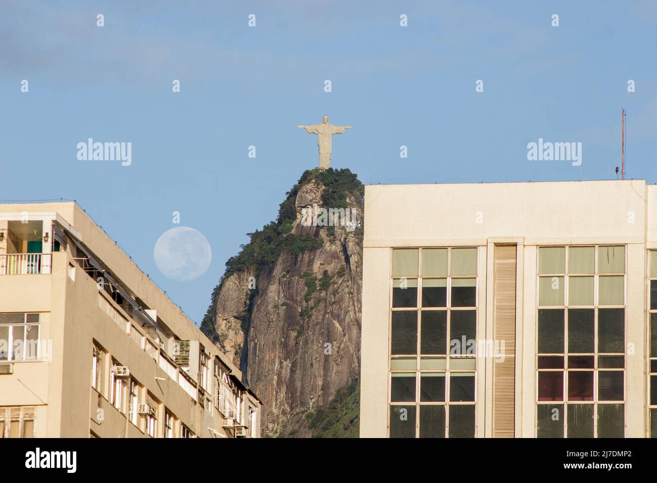 Christ the Redeemer and the full moon in Rio de Janeiro, Brazil - April ...
