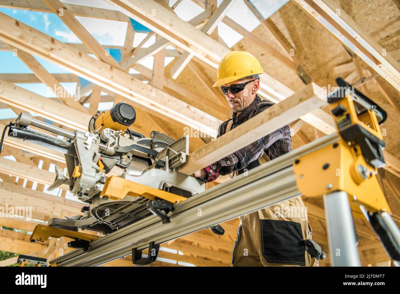 Caucasian Construction Contractor Cut to Size Wooden Structure Elements ...