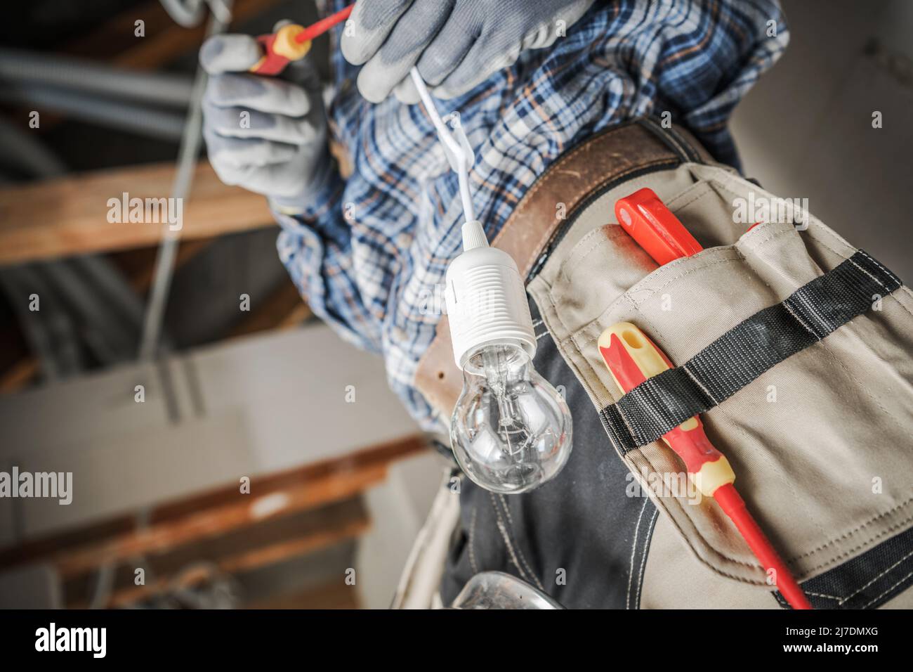 Electrician Installing New Light Point Inside a House. Preparing Light ...