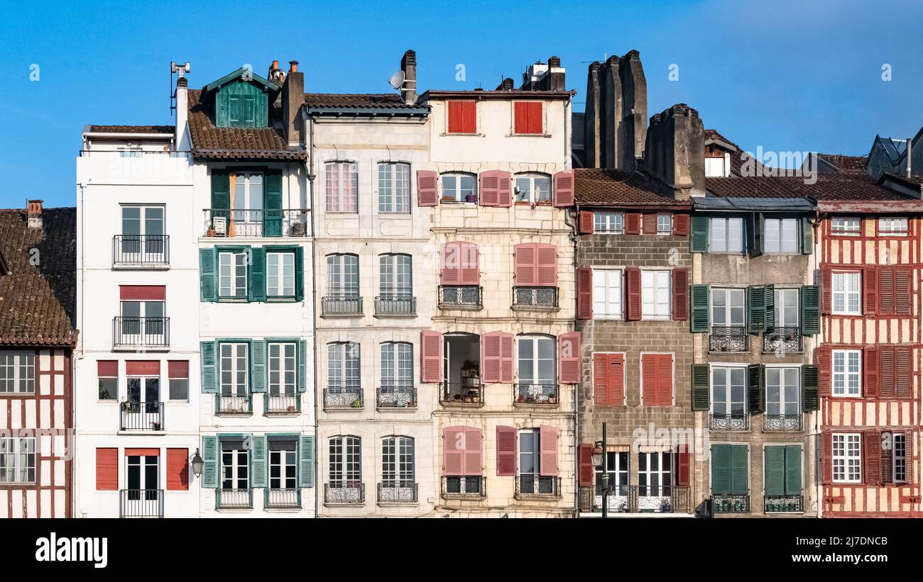 Bayonne in the pays Basque, typical facades with colorful shutters in ...