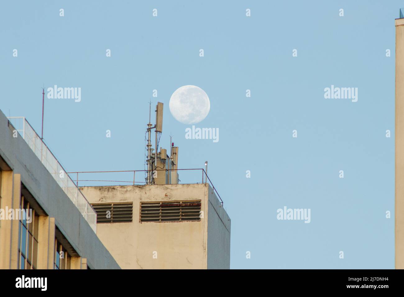 full moon setting Rio de Janeiro Stock Photo - Alamy