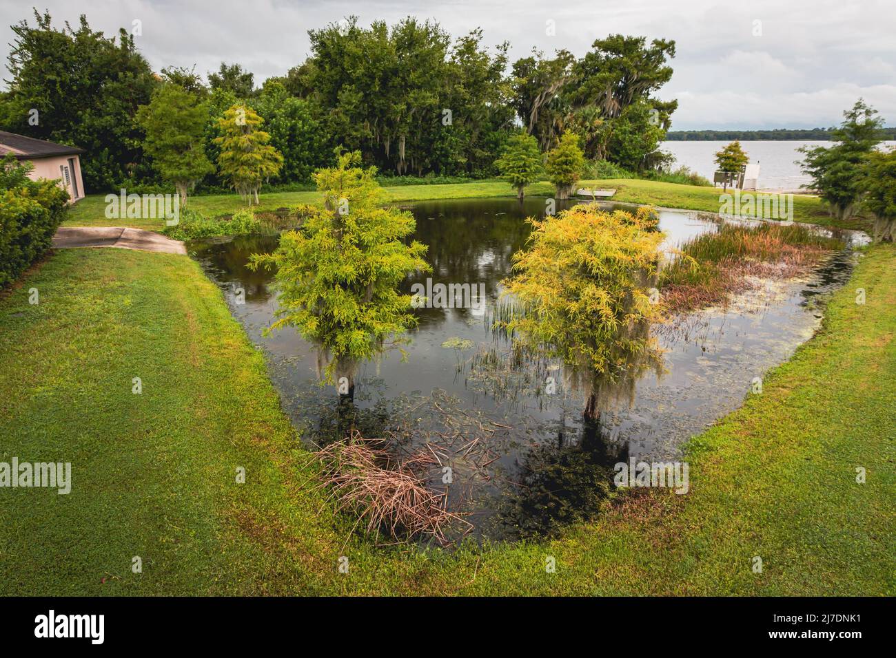 A retention pond close to a large lake for rainfall runoff Stock Photo ...
