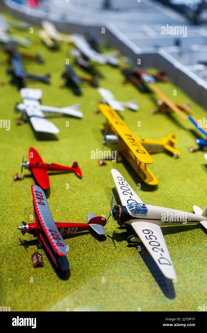 A set of miniature aircraft models on a green lawn. Berlin, Germany ...