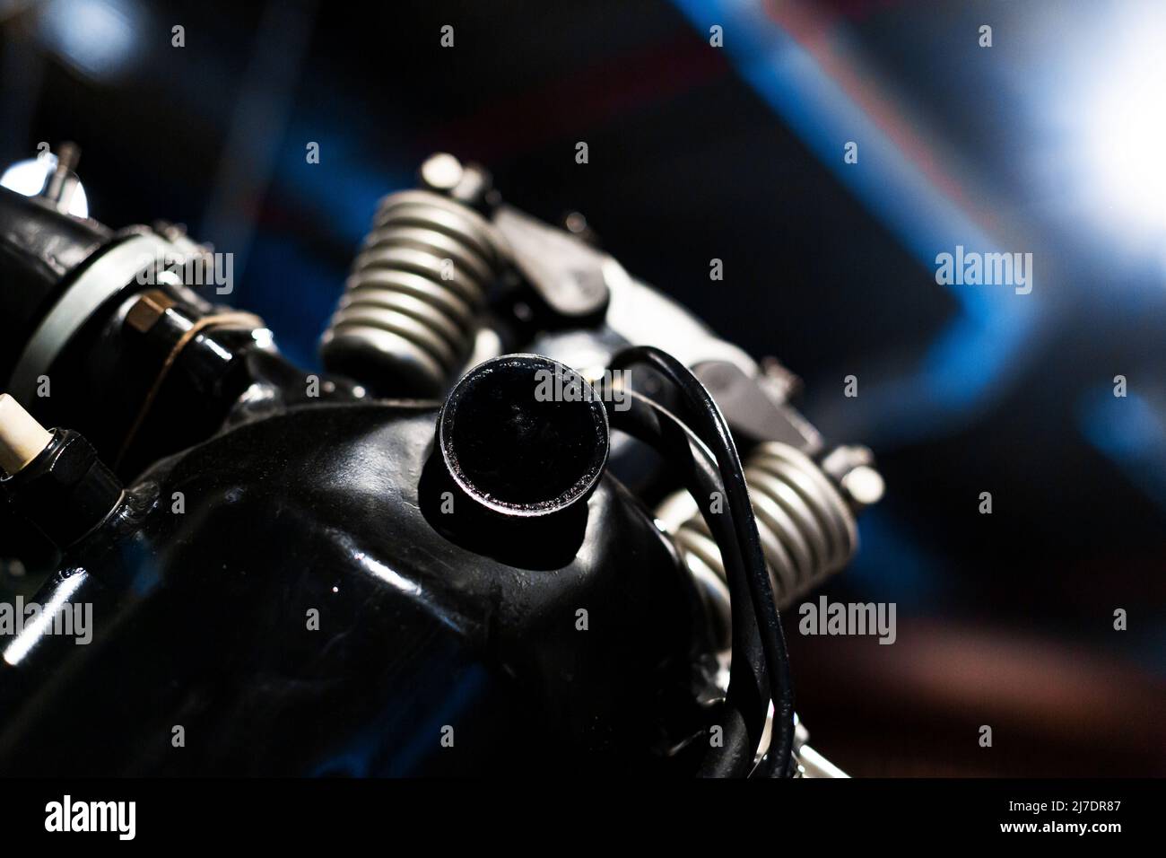 Close-up of a detail of a rare car engine. Metal mechanisms. Automotive ...