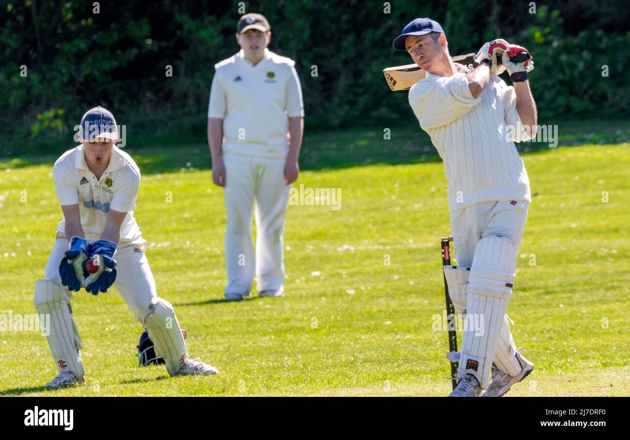Sunday cricket match in sunshine Stock Photo - Alamy