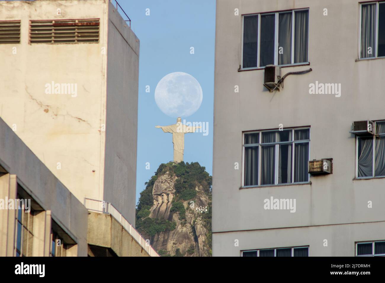 Christ the Redeemer and the full moon in Rio de Janeiro, Brazil - April ...