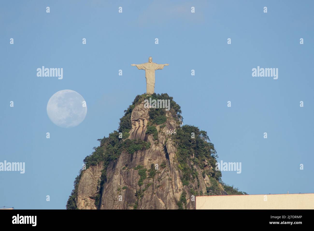 Christ the Redeemer and the full moon in Rio de Janeiro, Brazil - April ...