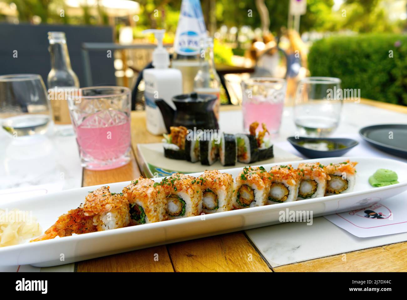 sushi restaurant. Outside table set up and dish presentation. Raw ...