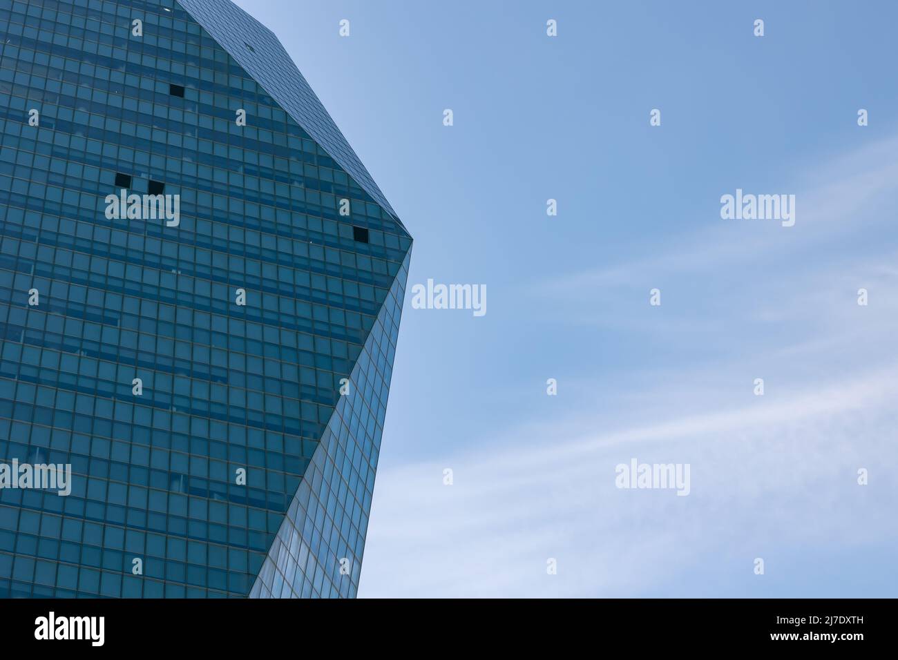 Modern architecture background photo. A skyscraper with sharp edge ...