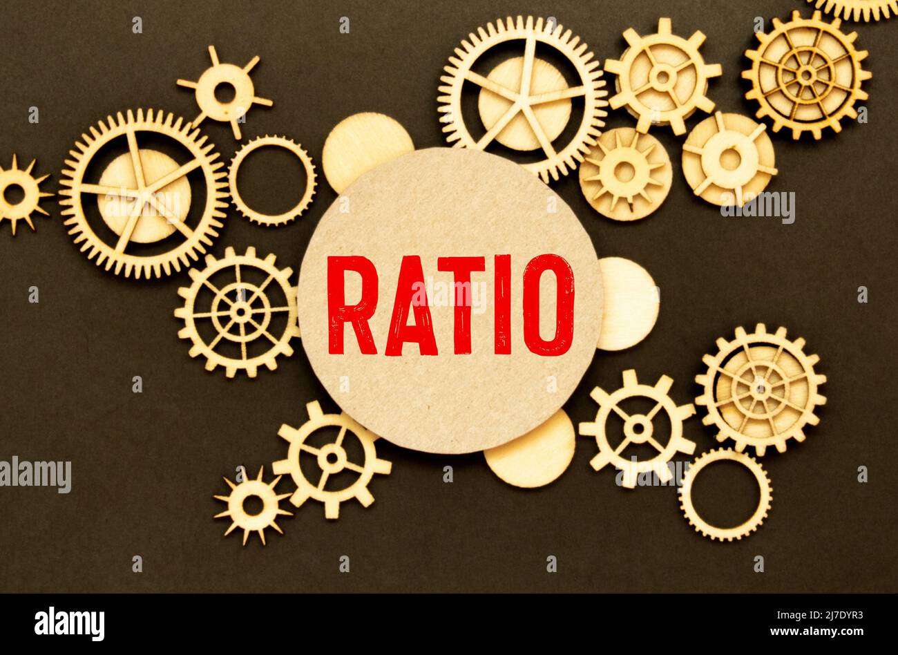 RATIO text on white paper on light background with charts paper Stock ...
