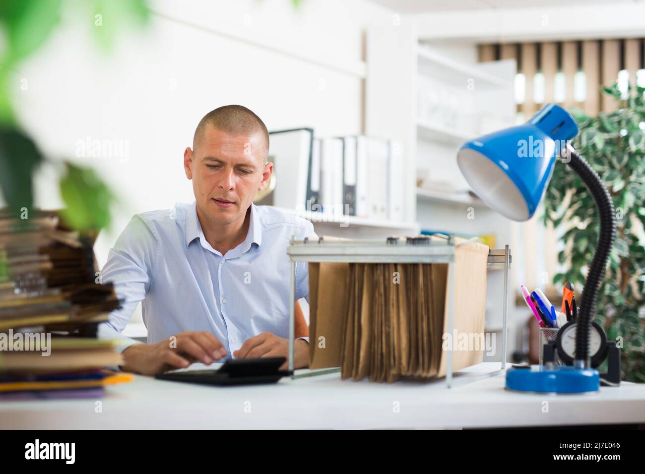 Office employee working with card index at workplace Stock Photo - Alamy