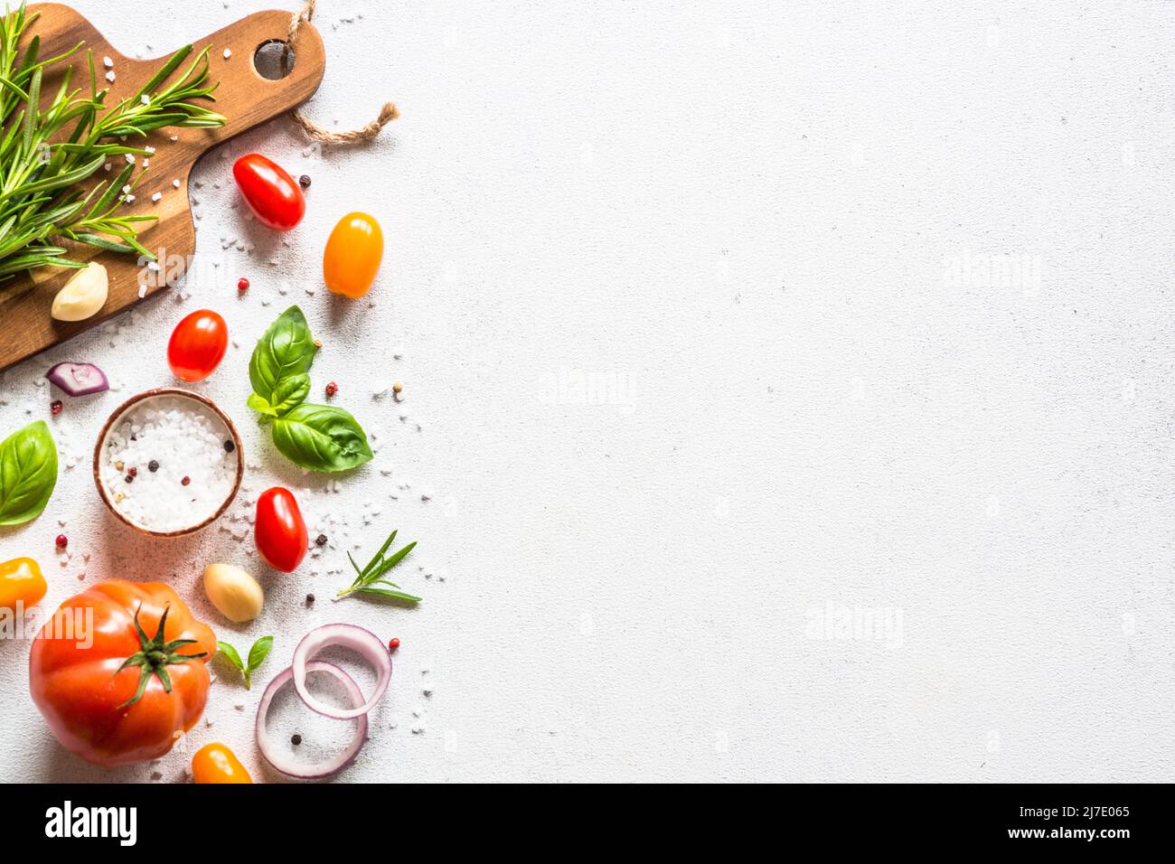 Food cooking background on white stone table Stock Photo - Alamy