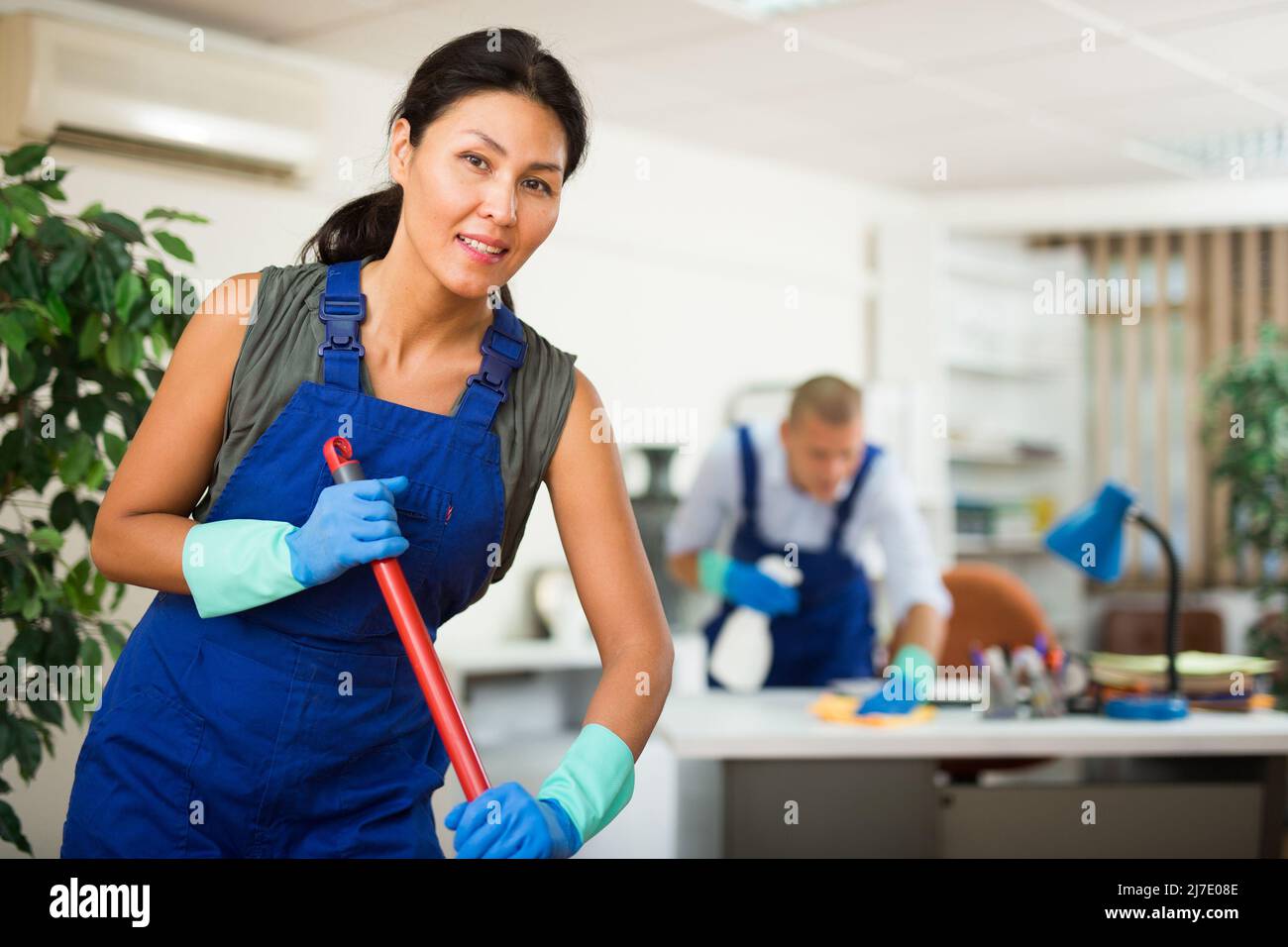 Female asian janitor cleaning hi-res stock photography and images - Alamy