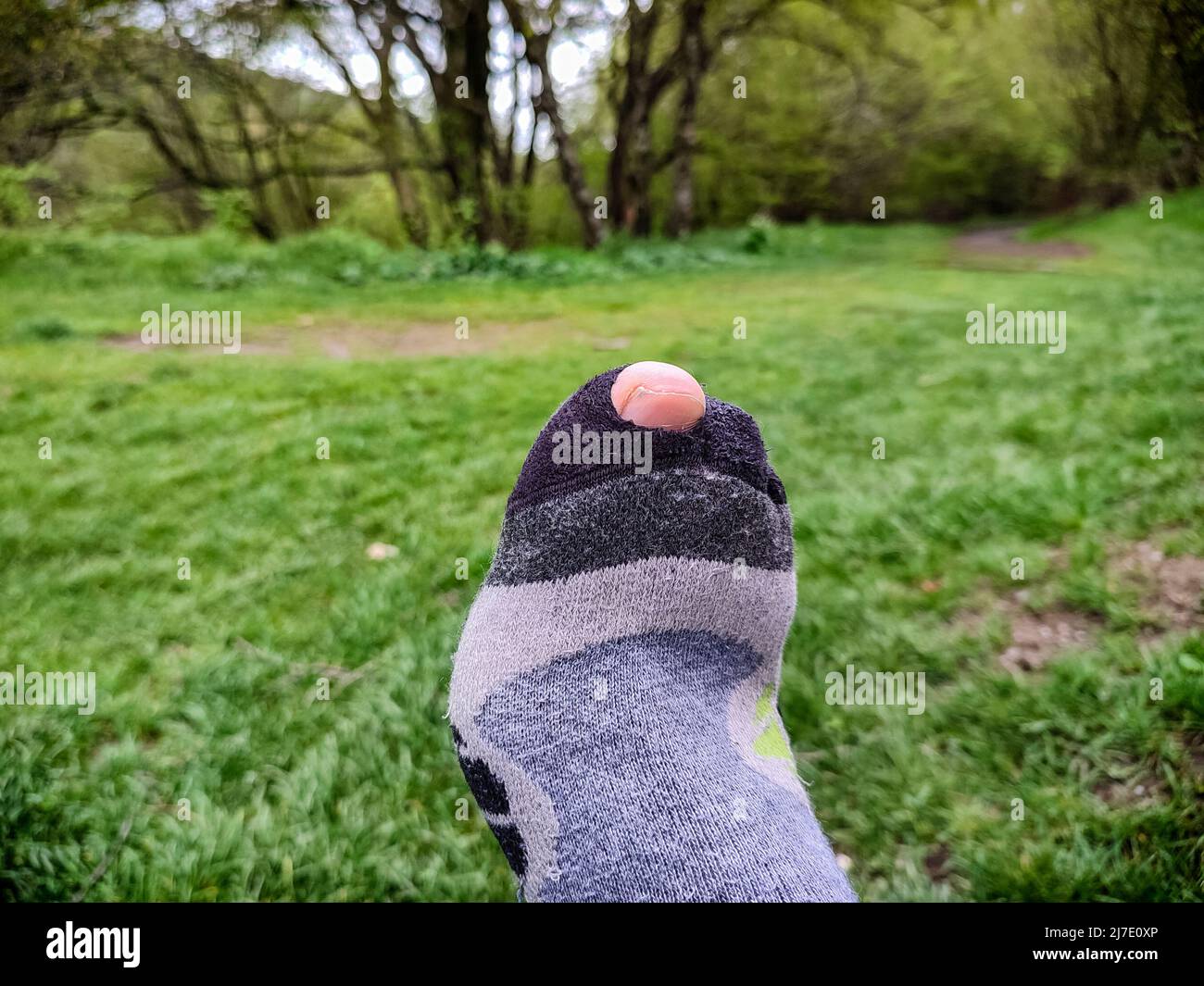 Person in old torn clothes hi-res stock photography and images - Alamy