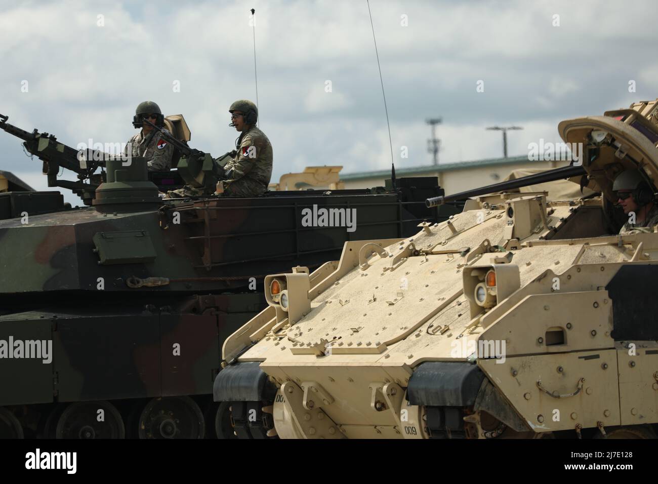 From the left, U.S. Army Staff Sgt. Alex Jobe, tank commander and Spc ...