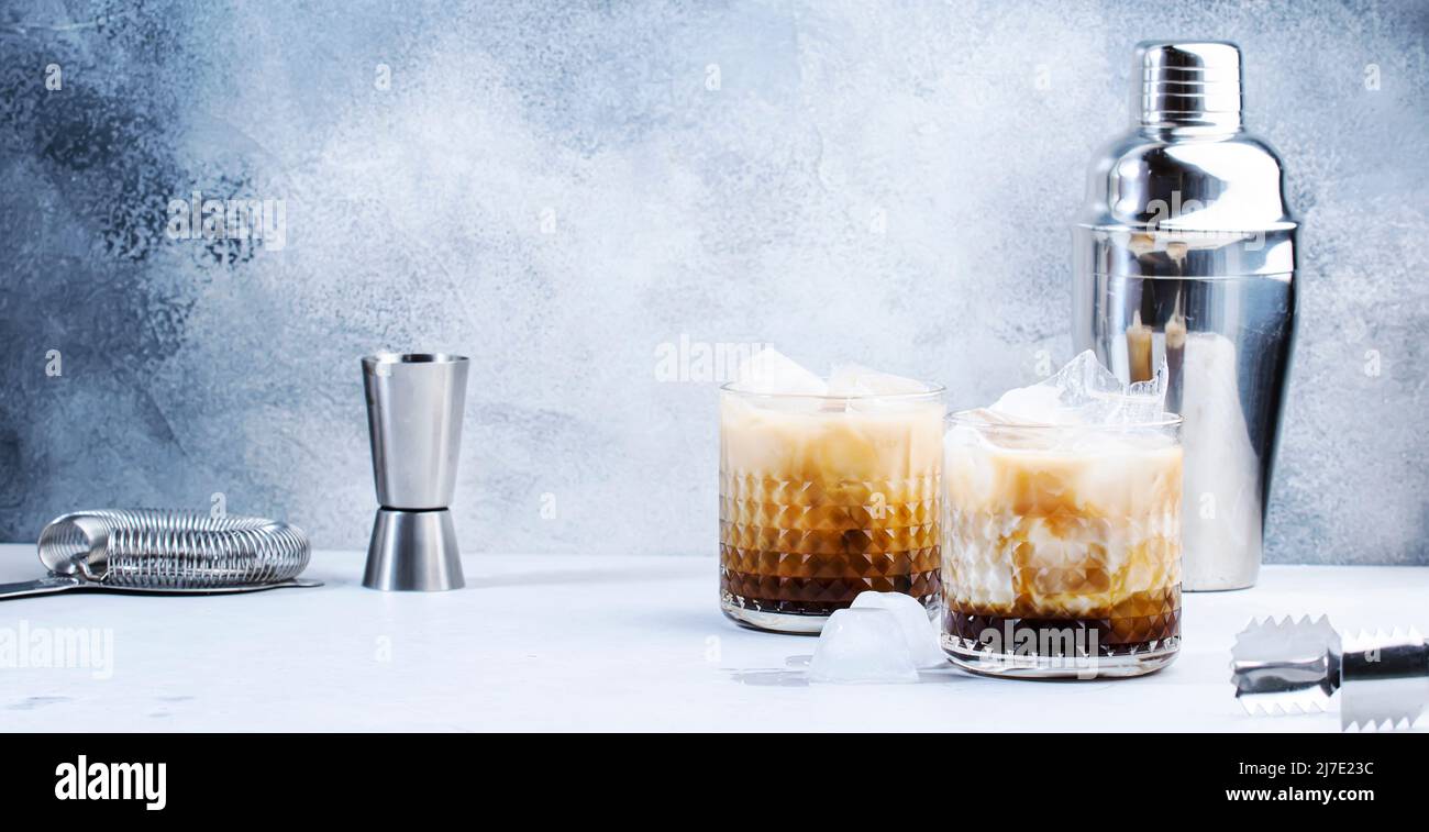Trendy alcoholic cocktail drink with vodka, coffee liqueur, cream and ...