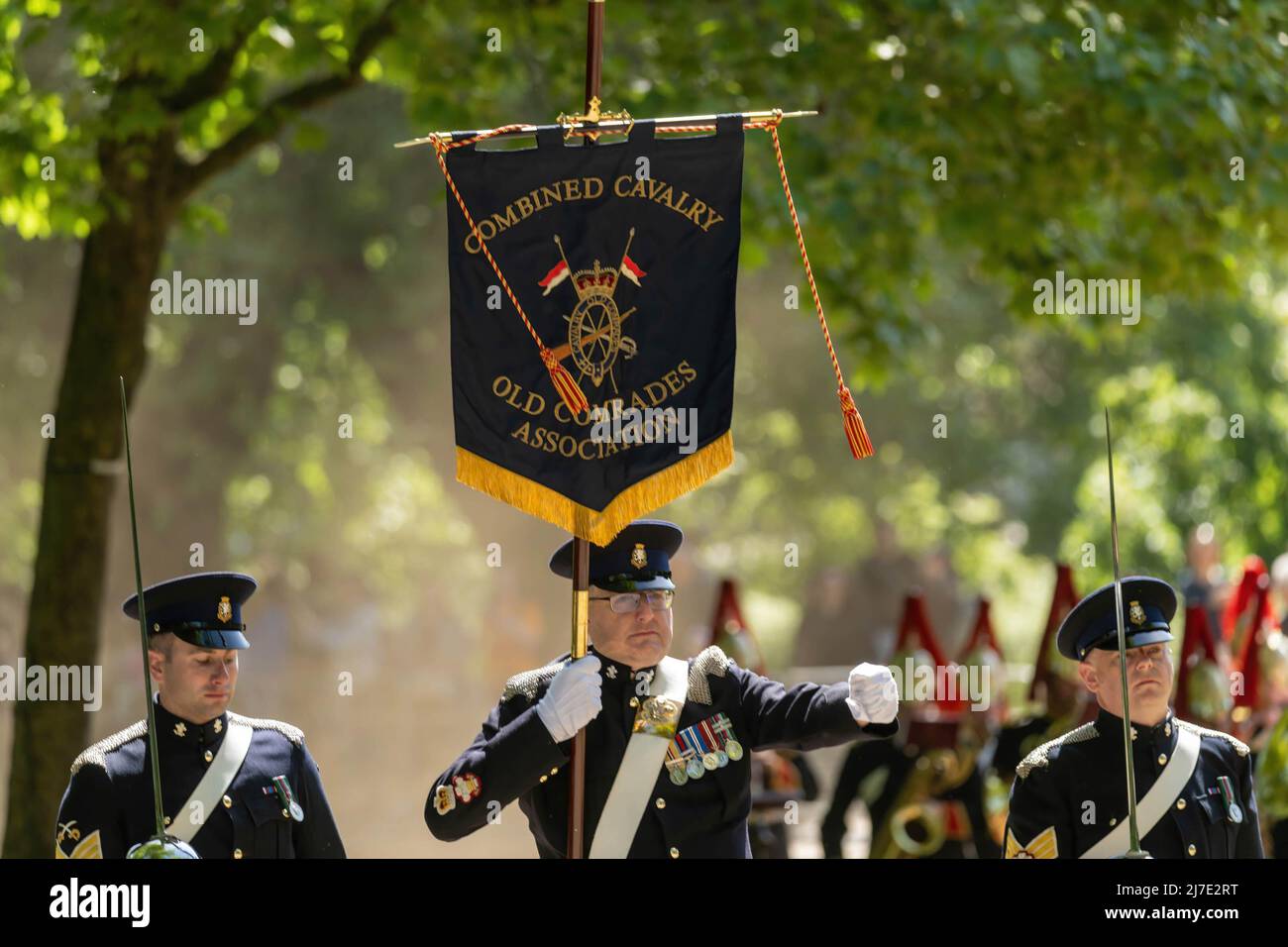 London, UK - 8 May 2022, An honour guard holds the banner of the ...