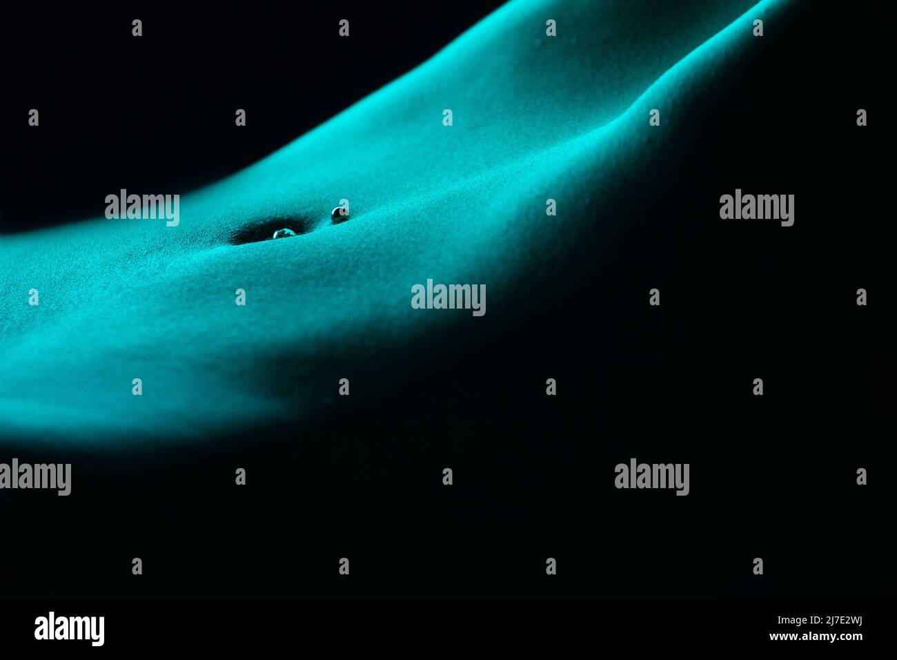 Bodyscape of a woman buttock. Macro shoot. Backlighted. Using negative ...