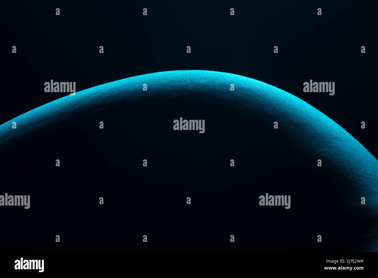 Bodyscape of a woman buttock. Macro shoot. Backlighted. Using negative ...