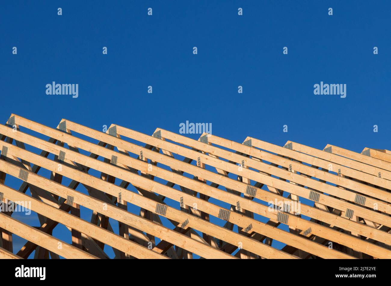 The roof rafters of a house under construction Stock Photo - Alamy