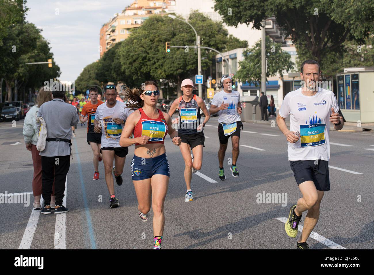 Runners seen on a street of the marathon route next to the stadium of ...