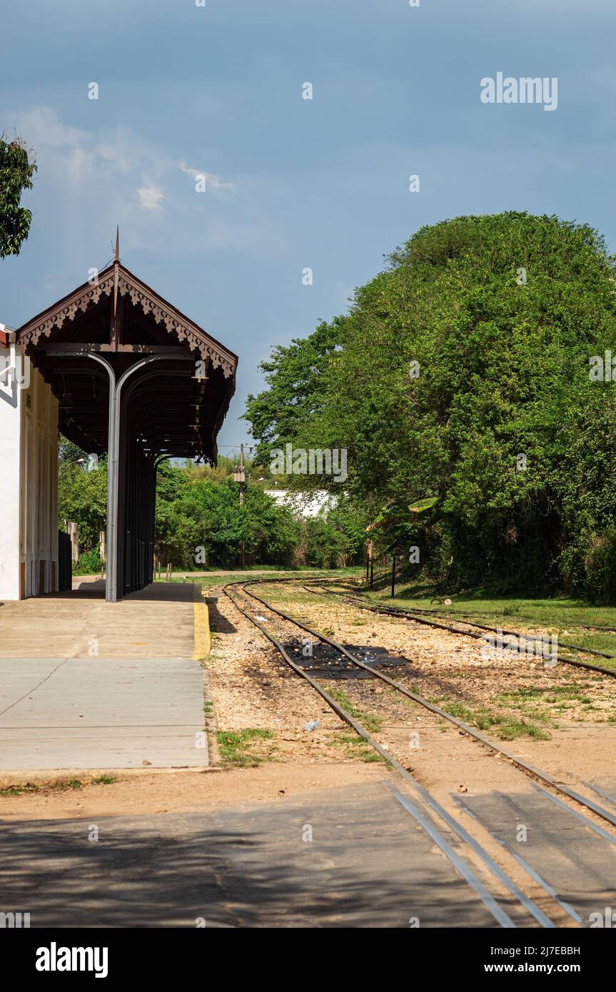 The old colonial Tiradentes railway station under sunny clouded blue ...