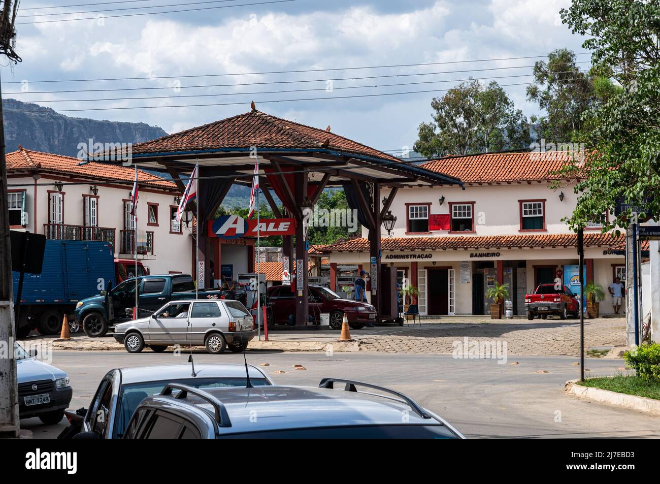An Ale gas station with some cars refueling. Filling station located at ...