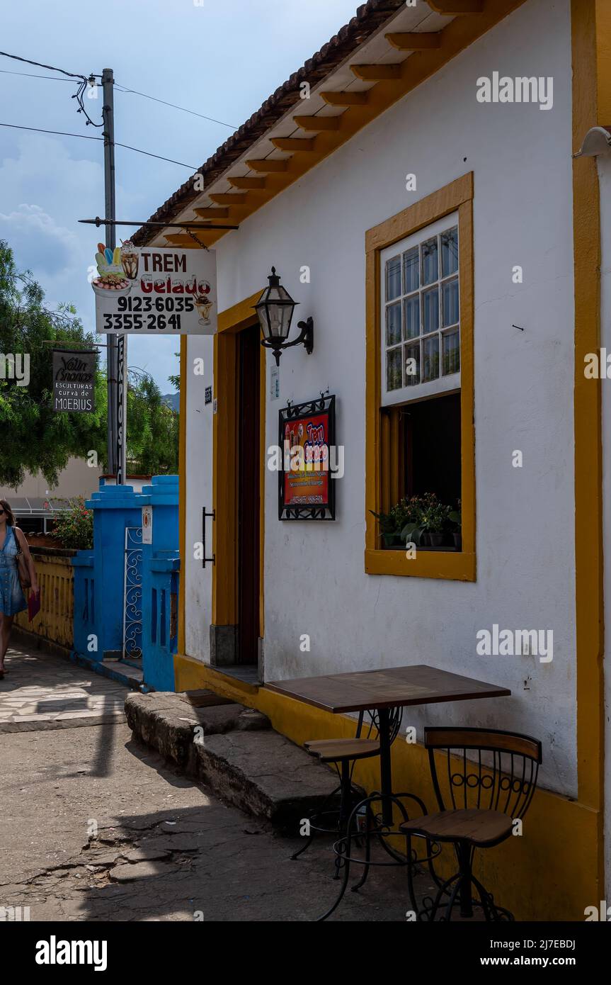 Facade and entrance of Trem Gelado ice cream shop running in a colonial ...