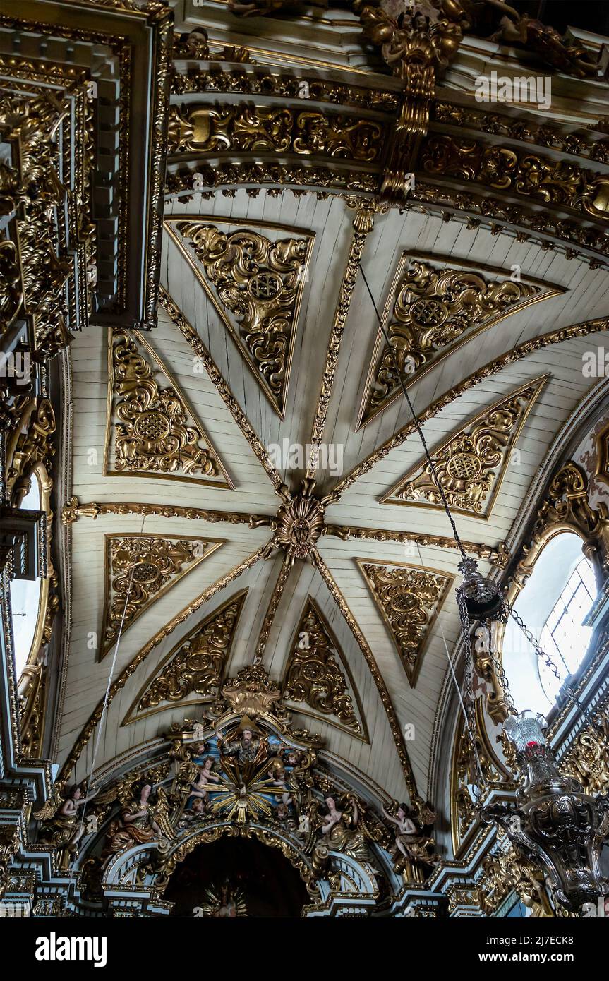The decorated ceiling of Nossa Senhora do Pilar cathedral with golden ...
