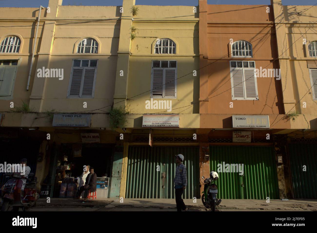A roadside commercial building in Palembang, South Sumatra, Indonesia ...