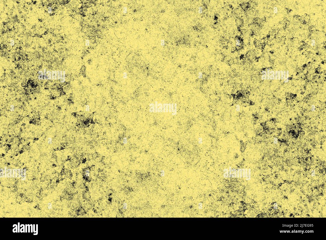 Scattered abstract grunge texture on a light yellow color wall ...