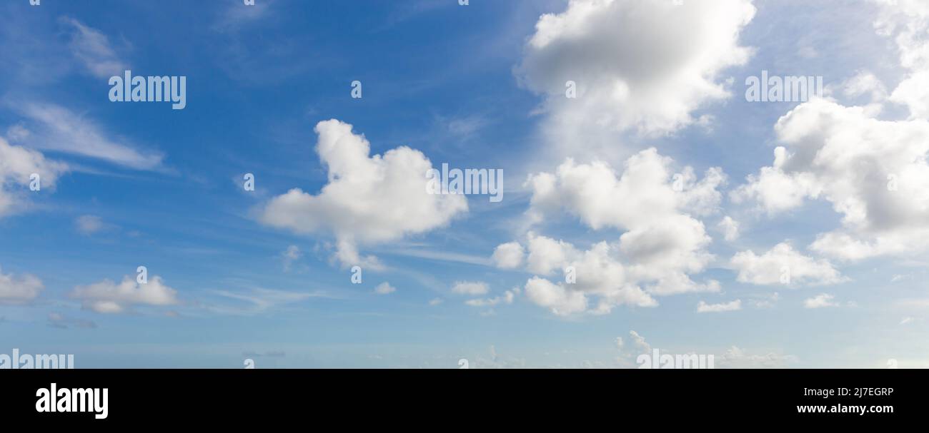 Panorama of blue sky with white clouds in clear weather Stock Photo - Alamy