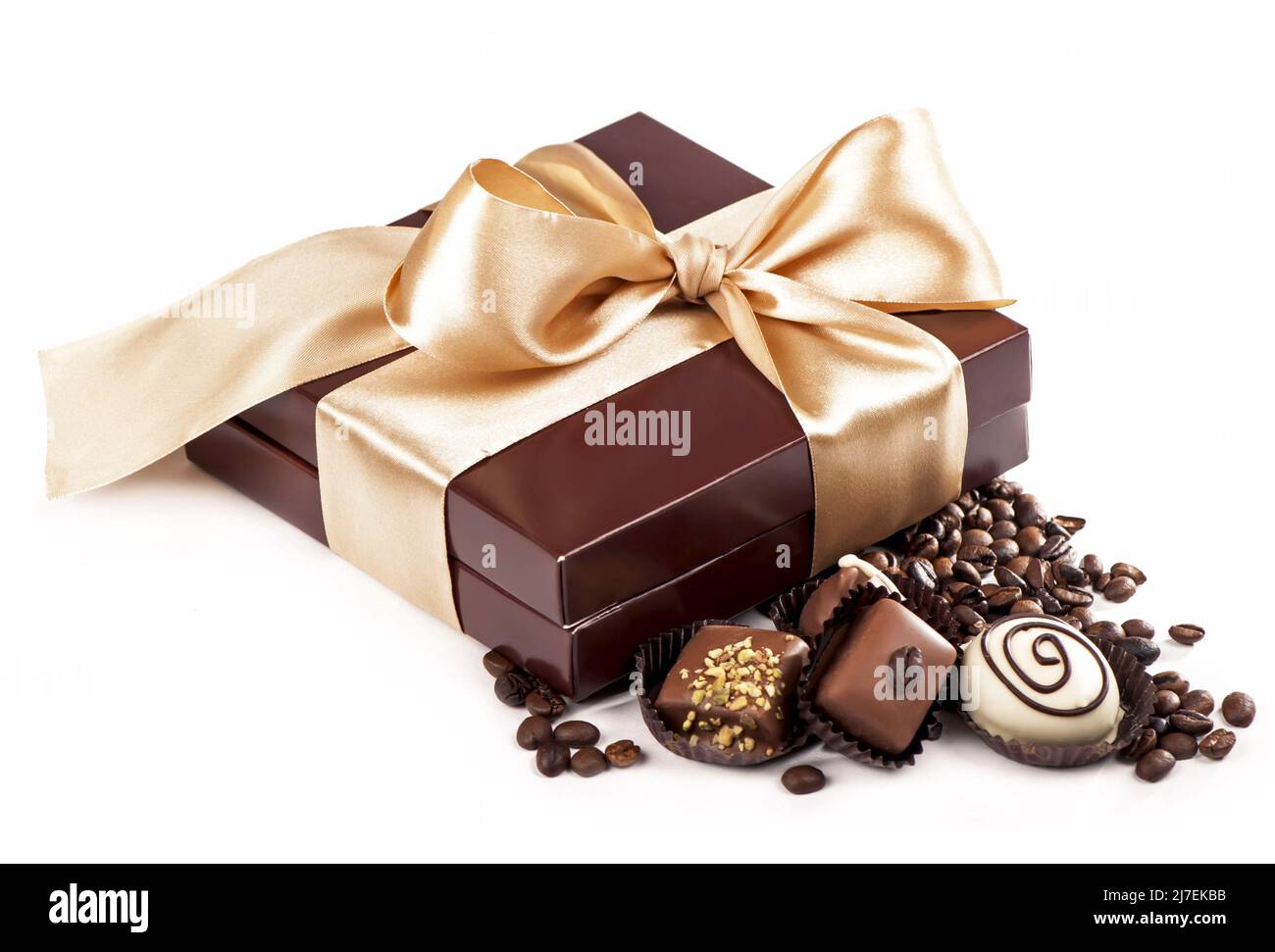 brown box with candies and golden tape on a white background Stock ...