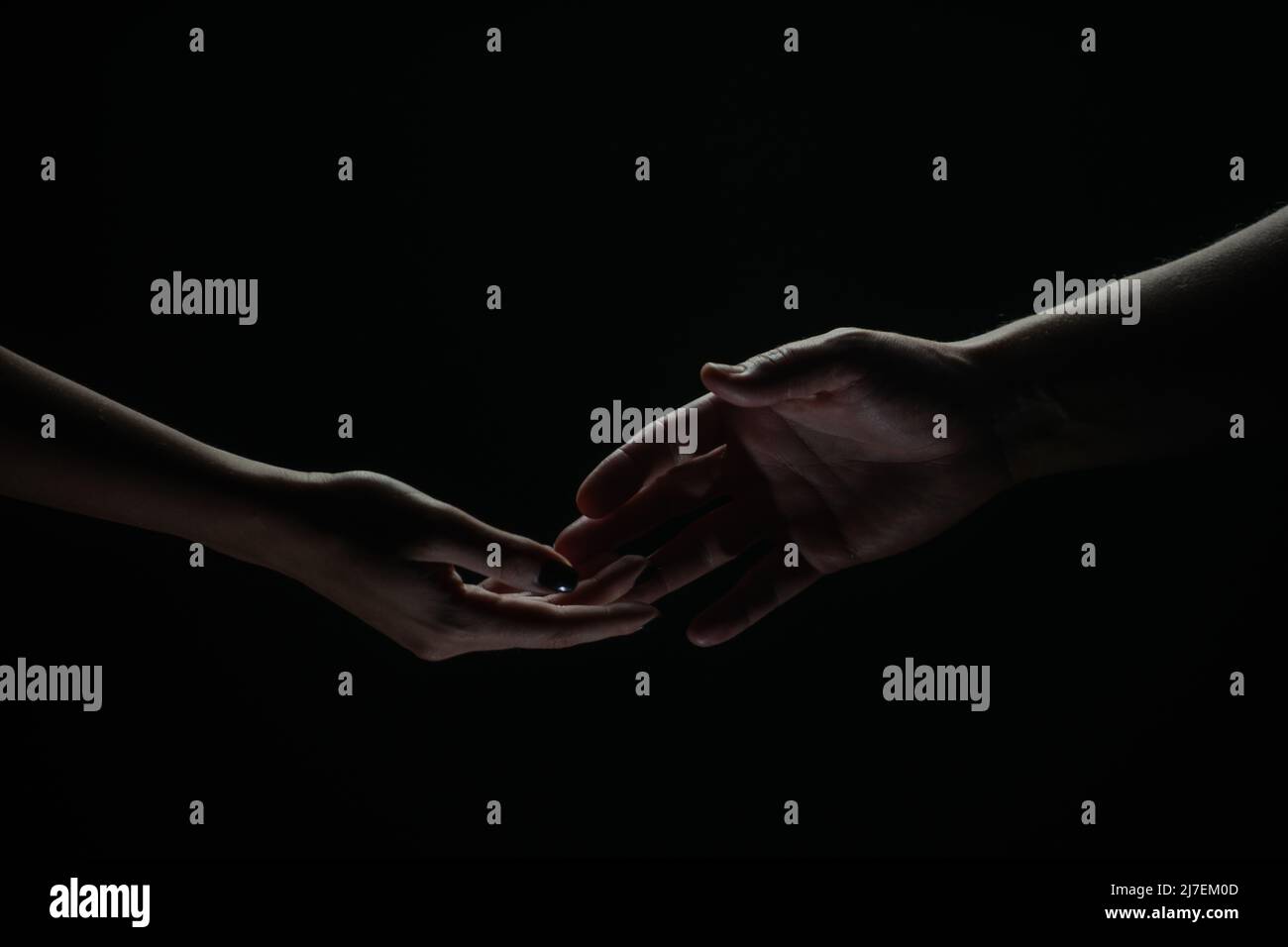 Two hands reaching toward. Helping hand outstretched for salvation on ...