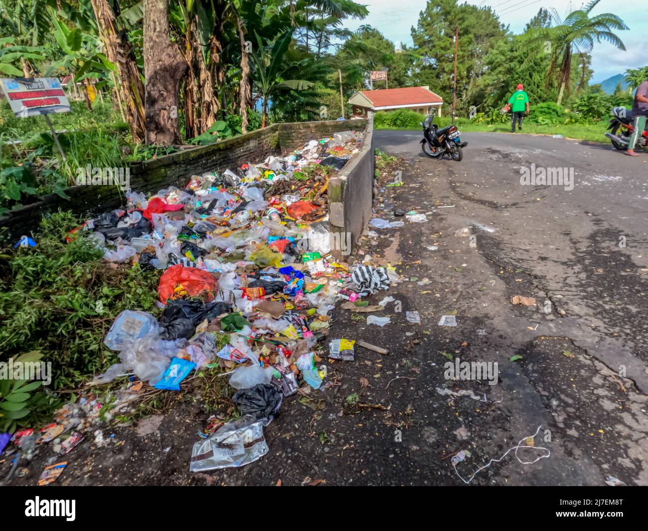 Garbage shelter on the edge of the village, mixed with natural waste ...